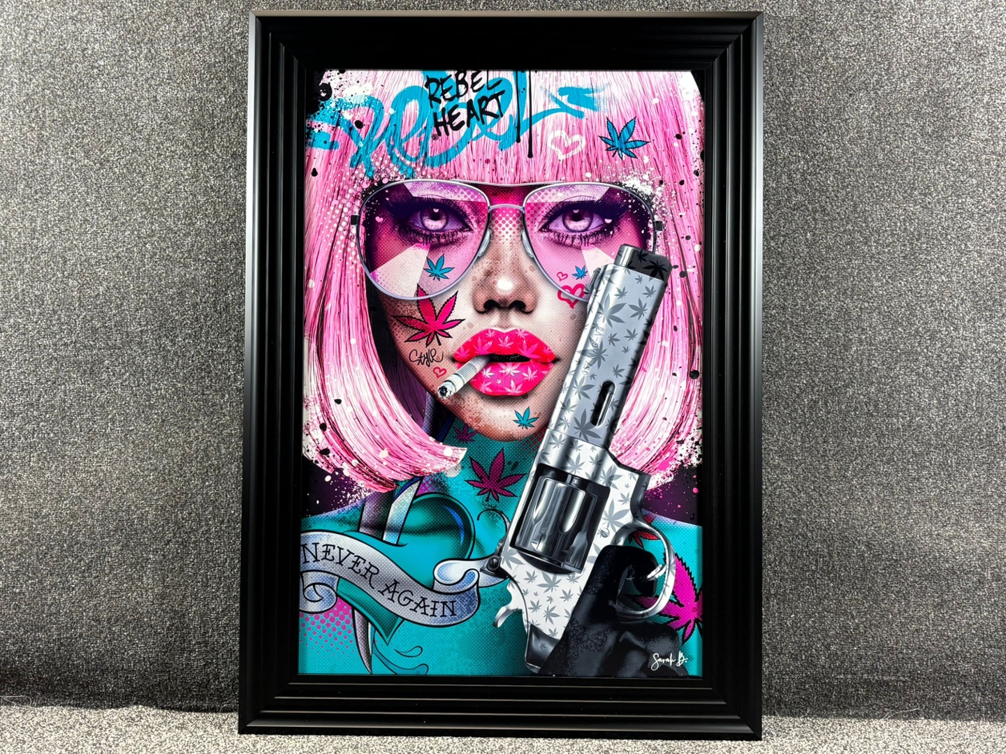 Framed Clear Coat Overlay Art Picture of a Lady in Pink Holding a Gun